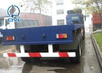 China 3 Axles New Loading Construction Machines Hydraulic Flatbed Semi Trailer 70 Tons 17m for sale