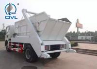 China Arm Swing Waste Collection 6 Cbm Garbage Compactor Truck for sale