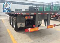 China 3 Axles 40 Feet Mechanical Equipment Hydraulic Flatbed Semi Trailer Polyurethane Paint for sale