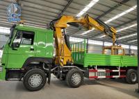 China 8x4 Howo Lorry Sidewall Cargo Truck Green Colour 14t Knuckle Boom Crane for sale