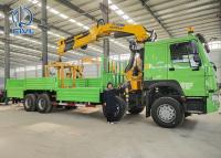China 8x4 Howo Lorry Sidewall Cargo Truck Green Colour 14t Knuckle Boom Crane for sale