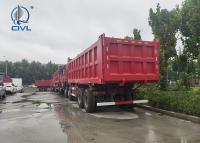 China Red Color  Tipper Commercial truck 8x4 Dump Trucks 40T RHD Low Fuel Consumption howo dumper truck for sale