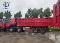 China Red Color  Tipper Commercial truck 8x4 Dump Trucks 40T RHD Low Fuel Consumption howo dumper truck for sale