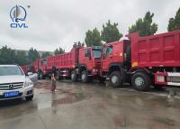 China Red Color  Tipper Commercial truck 8x4 Dump Trucks 40T RHD Low Fuel Consumption howo dumper truck for sale