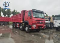 China Red Color  Tipper Commercial truck 8x4 Dump Trucks 40T RHD Low Fuel Consumption howo dumper truck for sale