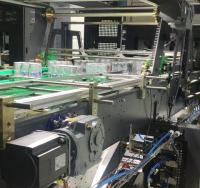 China Stainless Steel Automated Bottle Conveyor Systems Chain Belt Roller Conveying Machine for sale