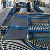 China Durable Roller Bag Conveyor Systems With 0-30m/min Adjustable Speed For High Volume Production Lines for sale
