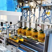China Fully Automatic Canned Fruits Carton Packer Machine for Fast and Reliable Fruit Packing for sale
