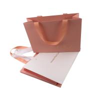 China Clothing Packaging Custom Printed Gift Bags , Paper Merchandise Bags for sale
