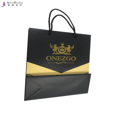 China Gold Stamping Custom Printed Gift Bags Paper Wine Bags With Handles 0.2mm Thickness for sale