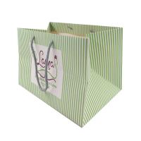 China Eco - Friendly Paper Printing Services Paper Carrier Bags With Twisted Handles for sale