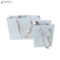 China Biodegradable Ribbon Handle Shopping Bags Custom Printed Paper  Glossy Lamination for sale