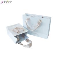 China Biodegradable Ribbon Handle Shopping Bags Custom Printed Paper  Glossy Lamination for sale