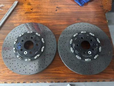 China Genuine OEM Front Carbon Ceramic Brake Disc Pair for Ferrari Roma.
No cracks, sufficient residual thickness, complete with hats and bolts, direct bolt-on fitment.
OE Part No.: 912544
Fits Ferrari Roma for sale