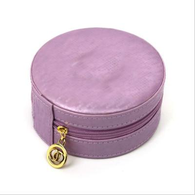 China Genuine Leather Round Mirrored Jewelry Box 11x11x5cm Zip Closure Custom for sale