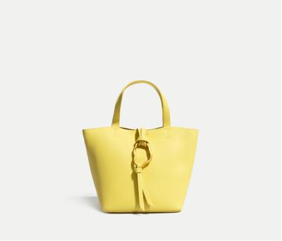 China 16cm Yellow Cowhide Leather Tote Bag Trapezoid Handbag for Women for sale