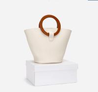 China 20cm Women's Leather Bucket Bag with Wooden Ring Handle Portable Handbag for sale