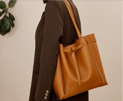 China PU Leather Brown Drawstring Bag ISO One Shoulder Messenger Bag for sale