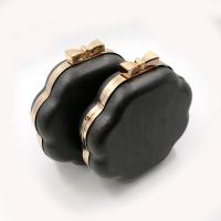 China Unique Bow Design Clasp Wavy Edge Round Shape Metal Box Clutch Frame for sale