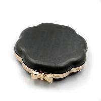 China Unique Bow Design Clasp Wavy Edge Round Shape Metal Box Clutch Frame for sale