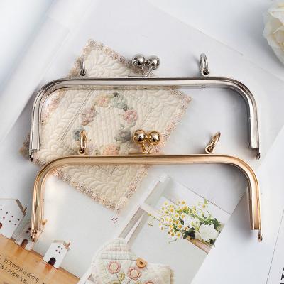 China 22x7.8cm Polished Electroplate Iron Kiss Clasp Purse Frame with Chain Loops for sale