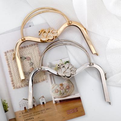 China Zinc Alloy Swan Closure Silver Purse Frame With Two Handle for sale