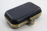 China Laser Print Skull Closure Antique Brass Purse Frame With Covers for sale