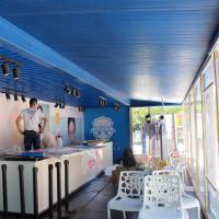 China 40 HC Single Side Expansion Fencing  Coffee Shop Container With Sandwich Panel for sale