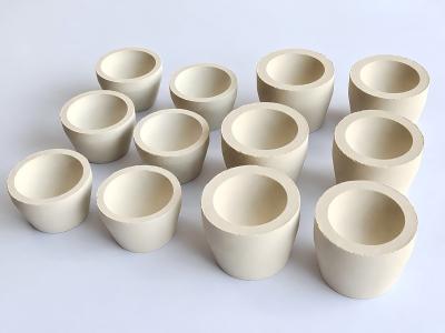 China 24 Hole Magnesia Cupel Brick with 96% MgO Content for Fire Assay Gold Testing for sale
