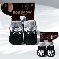 China Adorable Pet Dog Socks with Cartoon Pattern and Breathable Black Terry Knitted Design for sale