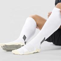 China Custom Kid Anti Slip Sock Football Sports Performance Grip Socks Logo position Cuff for sale