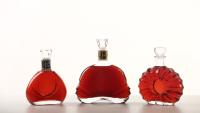 China 187ml 375ml 500ml 750ml Transparent Amber Green Blue Glass Red Wine Bottle for sale