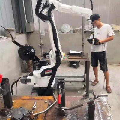 China High Productivity Robotic Welding System With 6 Axis Industrial Robot Arm for sale