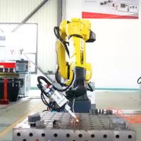 China Dual-Station Robot Laser Welding Cell 2000W Fiber Laser Source Rotary Table Loading System for sale