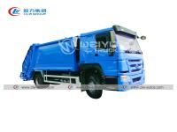 China Right Hand Drive HOWO 14cbm 290HP Rear Loader Garbage Compactor Truck Waste Management for sale