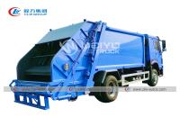 China Right Hand Drive HOWO 14cbm 290HP Rear Loader Garbage Compactor Truck Waste Management for sale