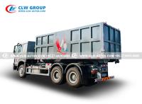 China SINOTRUK HOWO 336HP Right Hand Drive 6x4 Hook Lift Garbage Truck 20cbm for sale