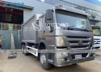 China Sinotruk Howo 14 Ton 18m3 Waste Removal Truck Solid Rubbish Disposal 6x4 RHD for sale