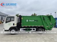 China Sinotruk Howo 4x2 120HP 6cbm Compactor Garbage Truck for Sanitation Waste Collection for sale