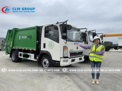 China Sinotruk Howo 4x2 120HP 6cbm Compactor Garbage Truck for Sanitation Waste Collection for sale
