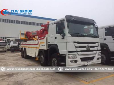 China SINOTRUK HOWO 8x4 360 Degree Rotation Heavy Duty Tow Truck 15 Ton Capacity for sale