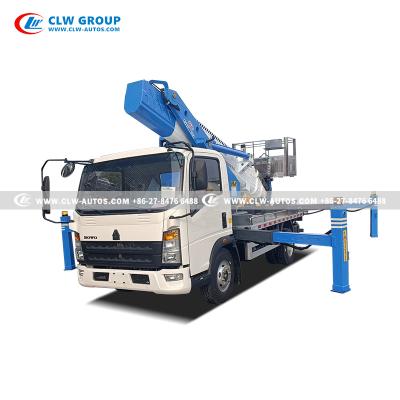 China Sinotruk HOWO 28m Aerial Platform Truck 7-Section Telescopic Boom 360 Rotation for sale