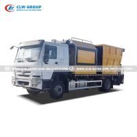 China Sinotruk HOWO 4x2 Synchronous Chip Sealer 6000L Asphalt Tank PLC Control Pavement Preservation Vehicle for sale