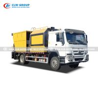 China Sinotruk HOWO 4x2 Synchronous Chip Sealer 6000L Asphalt Tank PLC Control Pavement Preservation Vehicle for sale