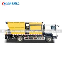 China Sinotruk HOWO 4x2 Synchronous Chip Sealer 6000L Asphalt Tank PLC Control Pavement Preservation Vehicle for sale