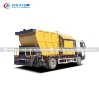 China Sinotruk HOWO 4x2 Synchronous Chip Sealer 6000L Asphalt Tank PLC Control Pavement Preservation Vehicle for sale