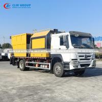 China Sinotruk HOWO 4x2 Synchronous Chip Sealer 6000L Asphalt Tank PLC Control Pavement Preservation Vehicle for sale