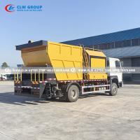 China Sinotruk HOWO 4x2 Synchronous Chip Sealer 6000L Asphalt Tank PLC Control Pavement Preservation Vehicle for sale
