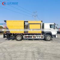 China Sinotruk HOWO 4x2 Synchronous Chip Sealer 6000L Asphalt Tank PLC Control Pavement Preservation Vehicle for sale