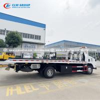 China Isuzu KV100 4x2 Flatbed Wrecker Truck 120HP Euro 6 3000kg Rear Underlift 5800mm Platform for sale